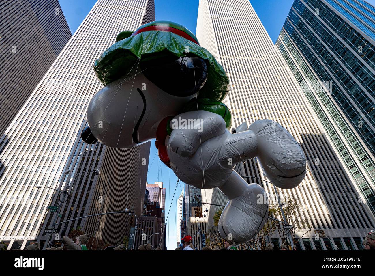 The Snoopy balloon floats above the road during the 97th Macy's ...
