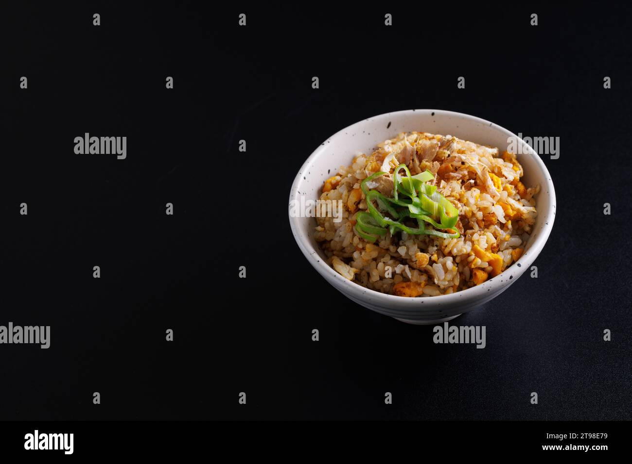 Japanese fried rice yakimeshi isolated in black background Stock Photo ...