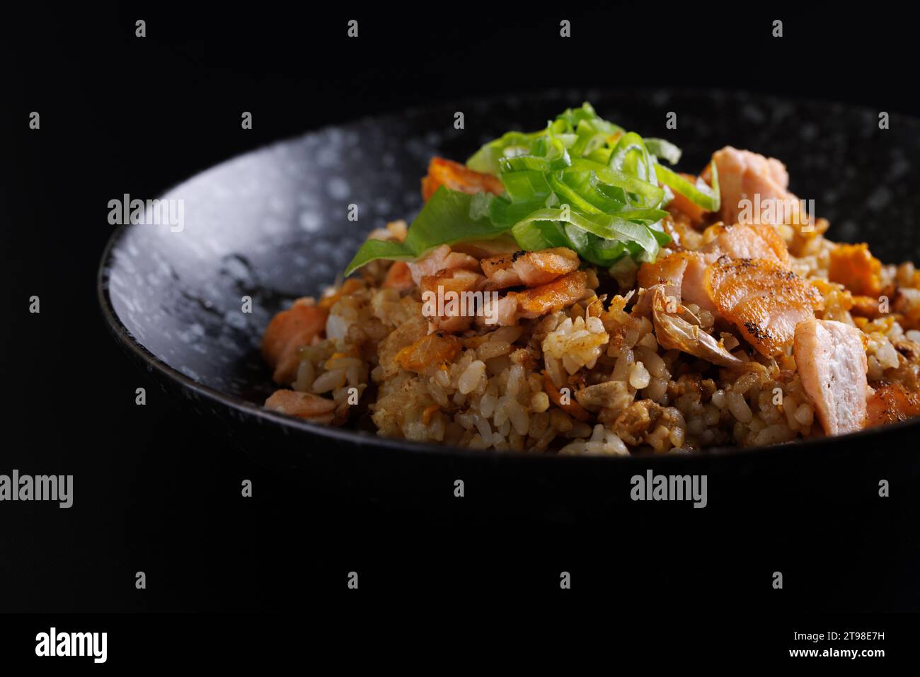 Japanese fried rice yakimeshi isolated in black background Stock Photo ...