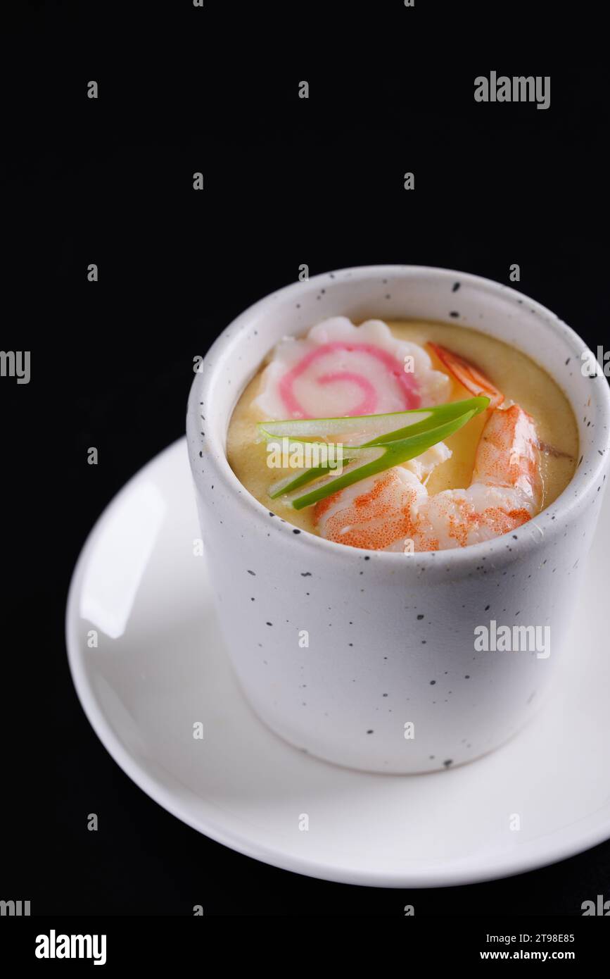 Japanese Traditional food Eggs Custard Chawanmushi isolated in black ...