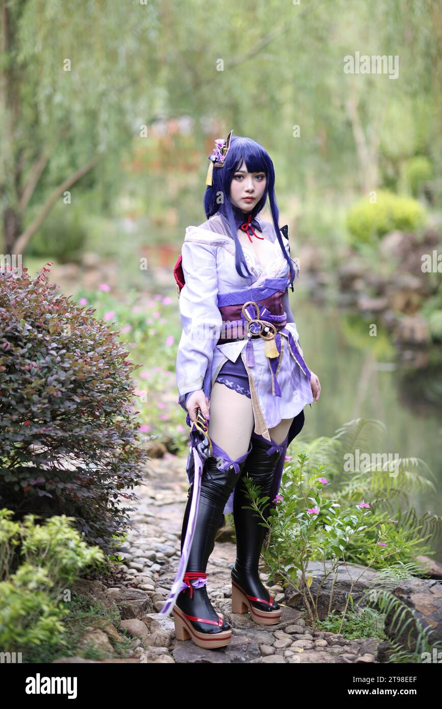 Portrait of a beautiful young woman game cosplay with samurai dress ...