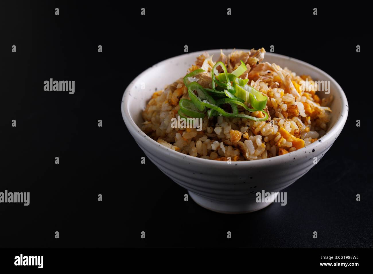 Japanese fried rice yakimeshi isolated in black background Stock Photo ...