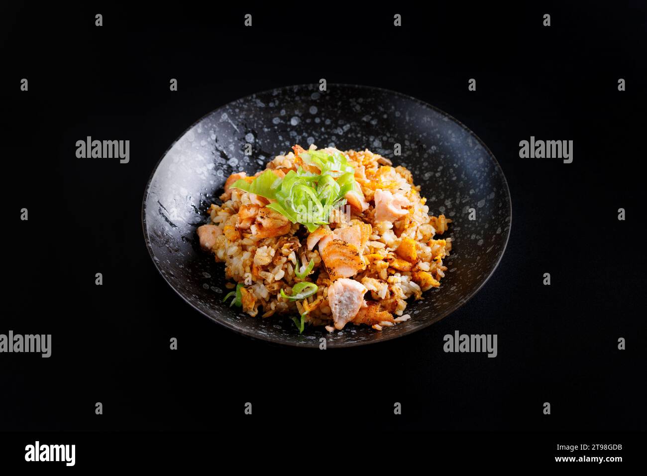 Japanese fried rice yakimeshi isolated in black background Stock Photo ...