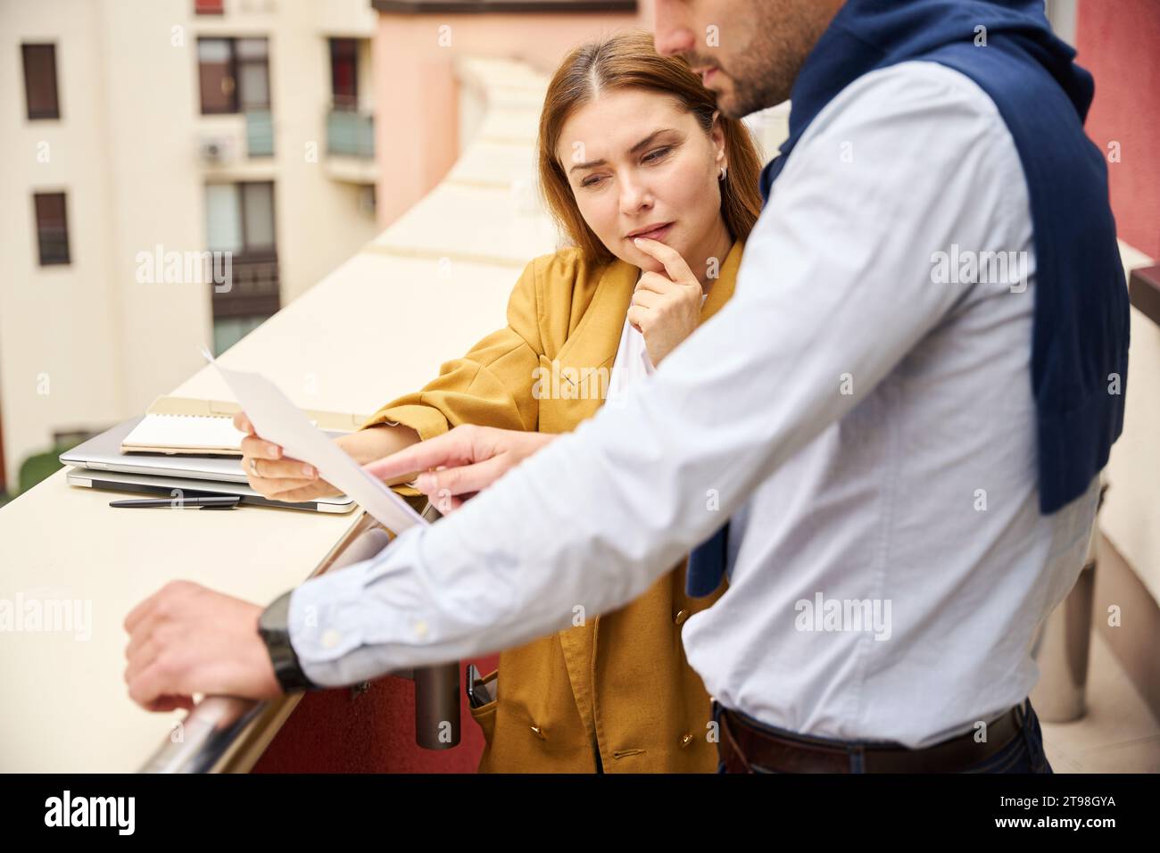 Female manager looking through documents hi-res stock photography and ...
