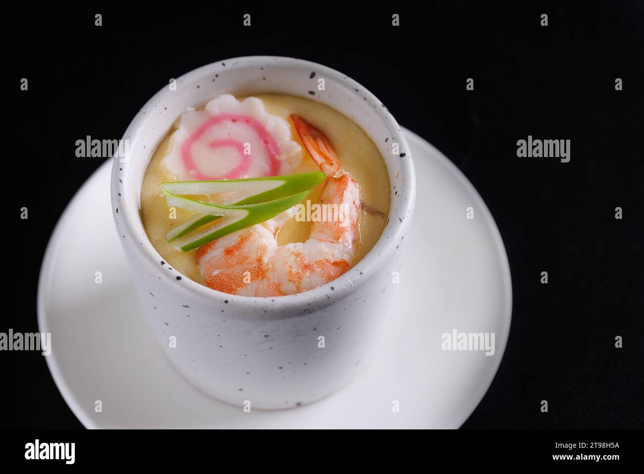 Japanese Traditional food Eggs Custard Chawanmushi isolated in black ...