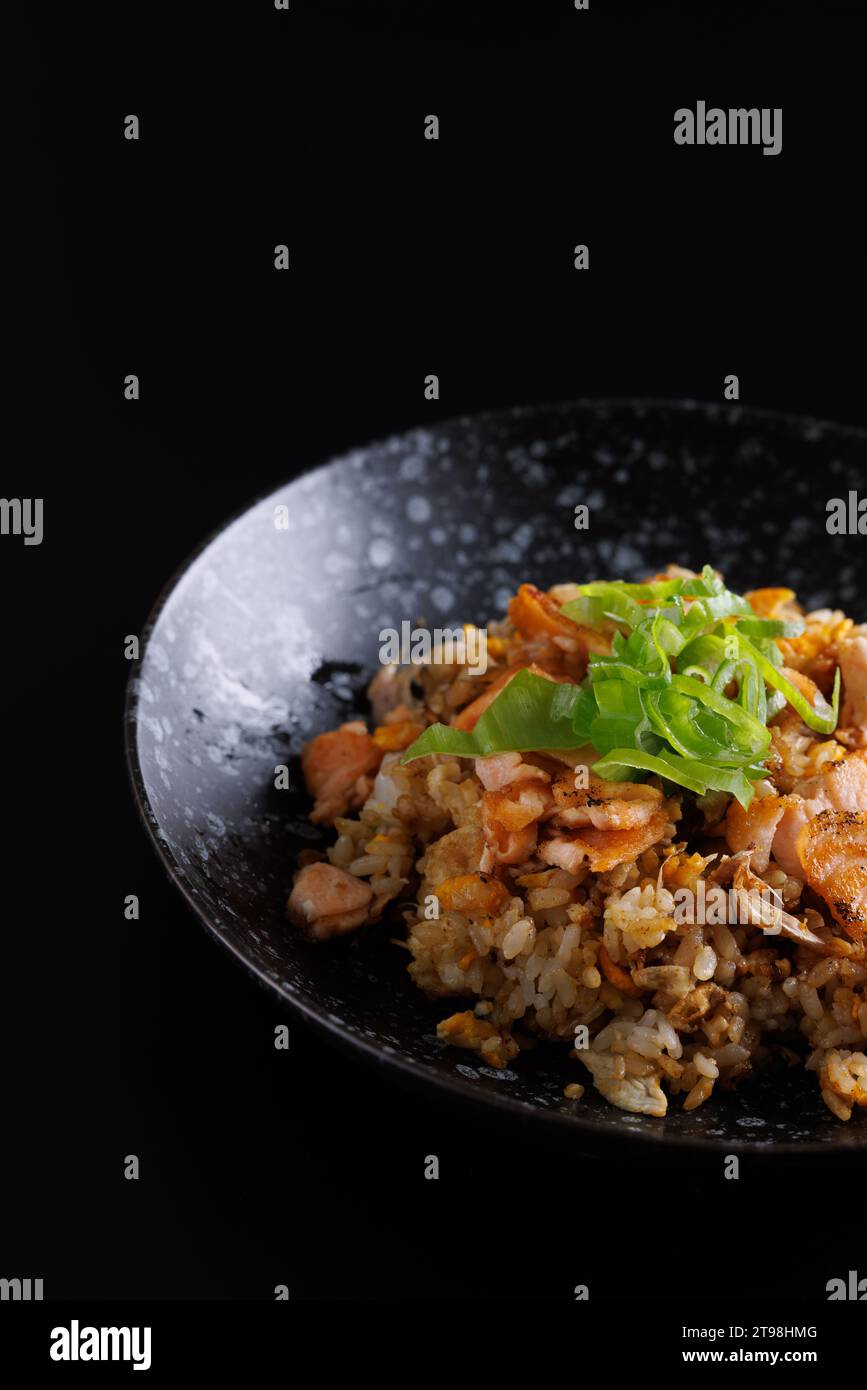 Japanese fried rice yakimeshi isolated in black background Stock Photo ...