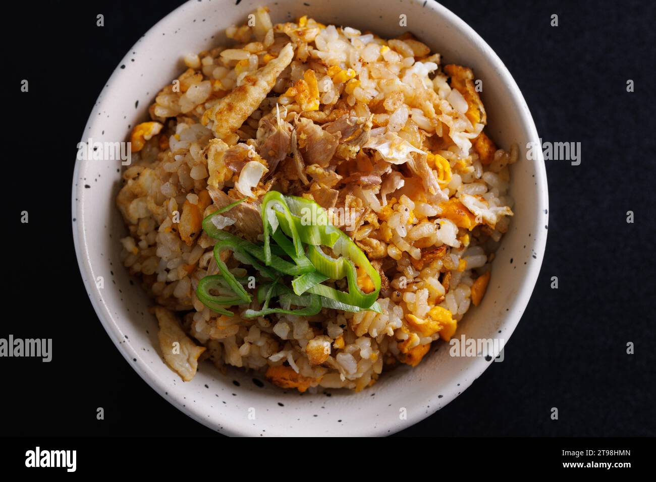 Japanese fried rice yakimeshi isolated in black background Stock Photo ...