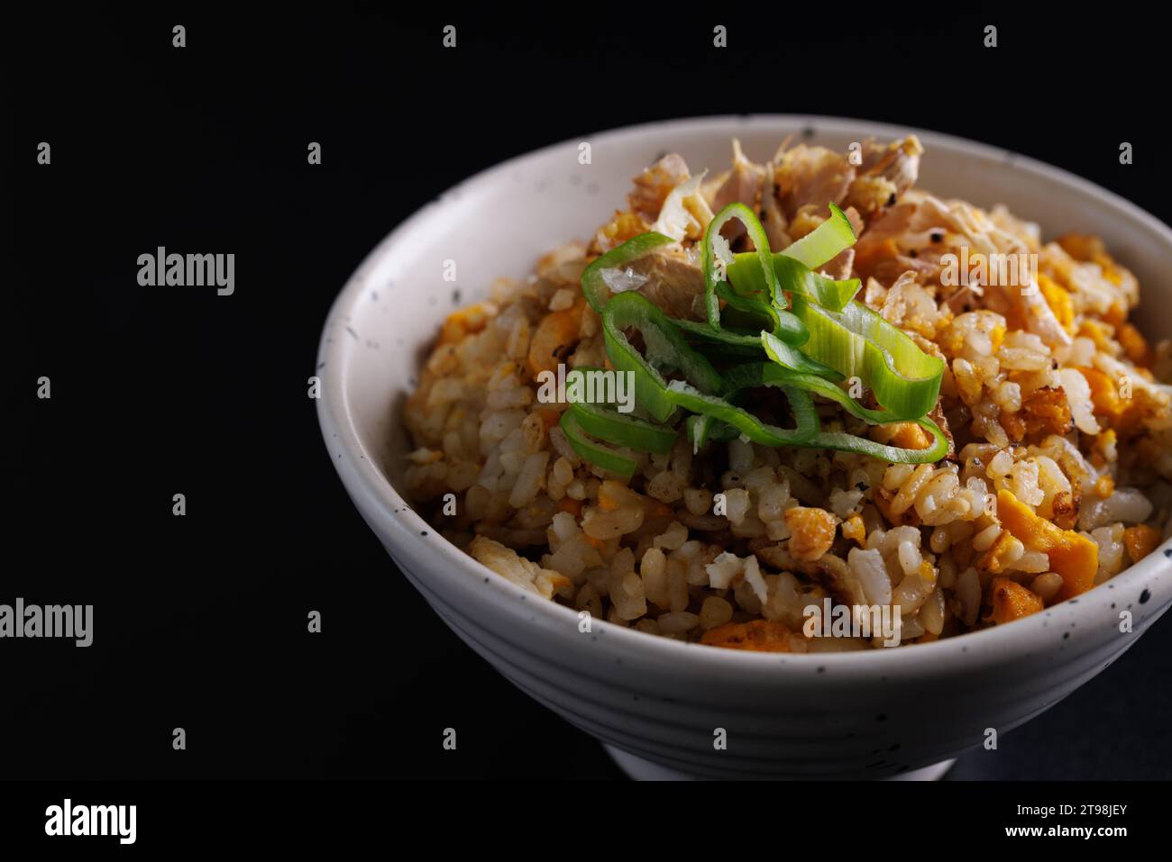 Japanese fried rice yakimeshi isolated in black background Stock Photo ...