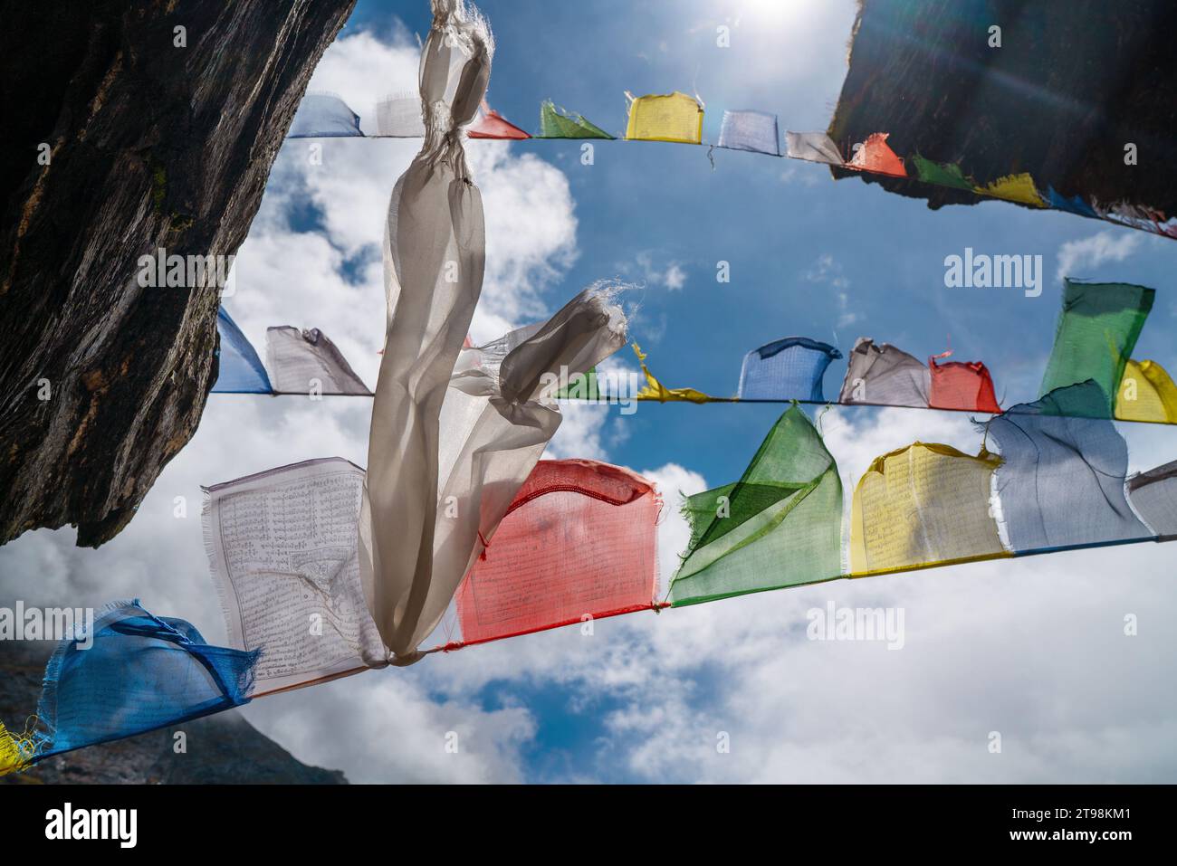 Holy Buddhist praying multicolored flags with mantras flapping and ...