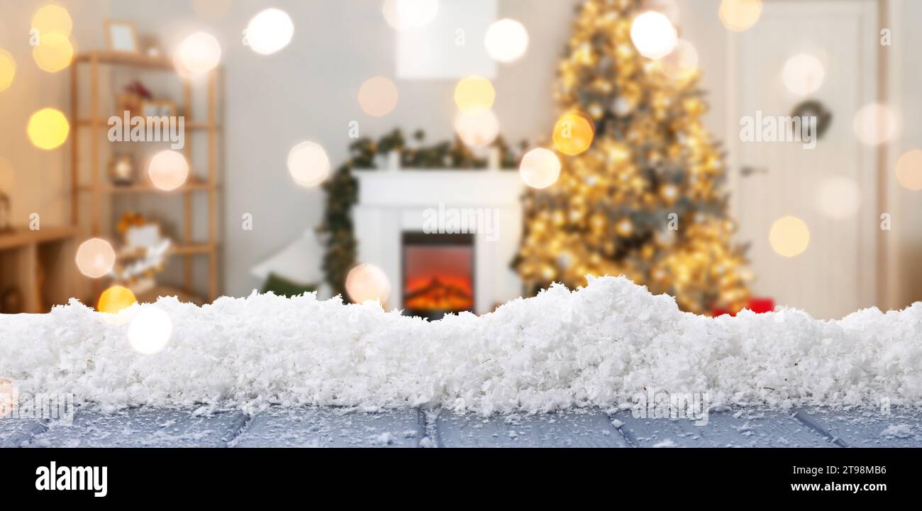 Empty wooden table with snow in room decorated for Christmas Stock ...