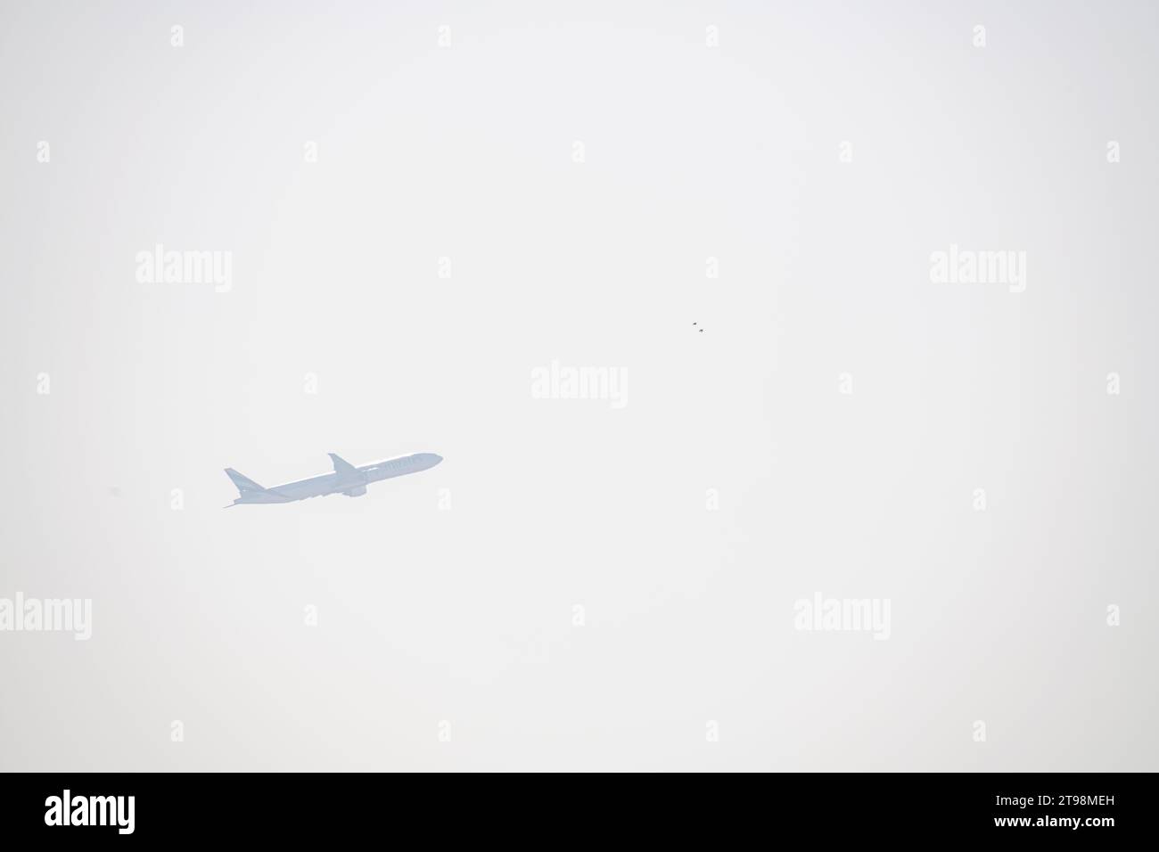 A plane takes off in a smoggy haze of pollution Stock Photo - Alamy