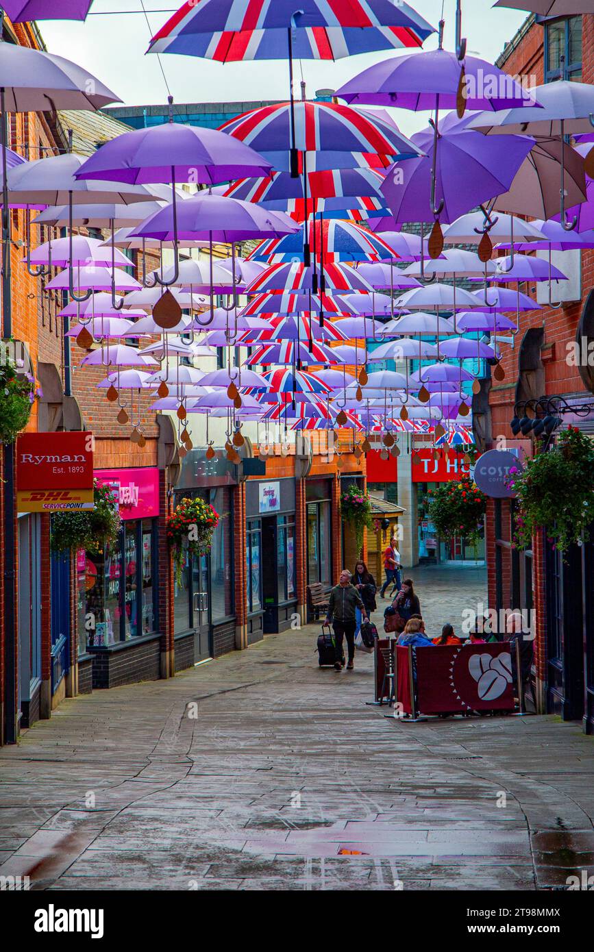 Durham City Centre shopping street with a ceiling of umbrellas Stock ...