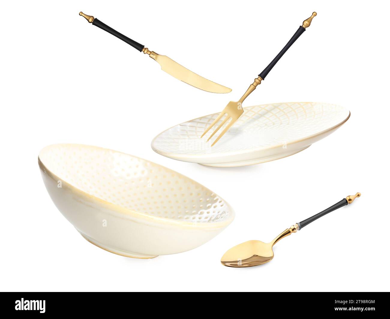 Clean dishes, fork, spoon and knife falling on white background Stock ...
