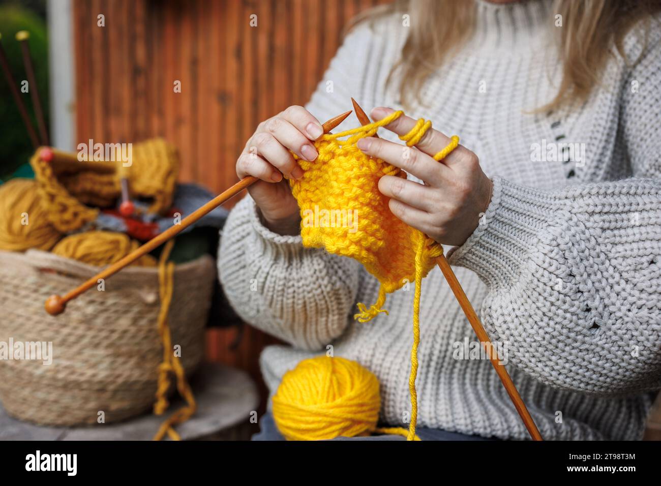 Creative woman knitting wool sitting hi-res stock photography and ...