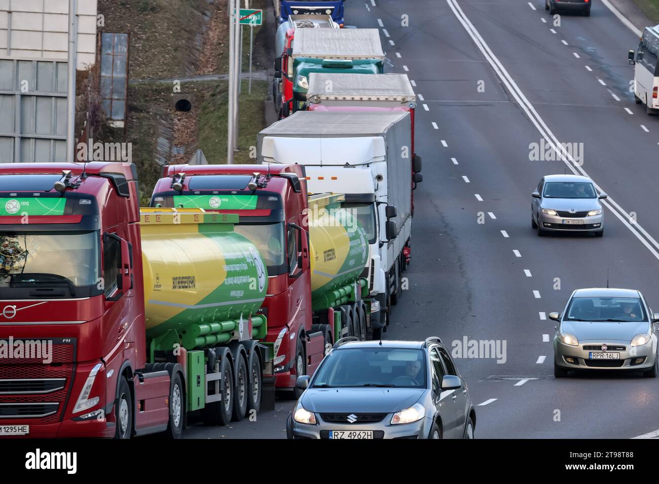 Trucks, including UPG - Ukrainian national fuel importer, stand in a ...