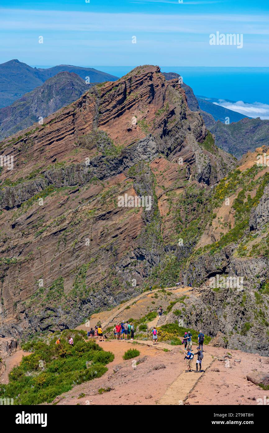Pico do Areeiro mountain in Madeira Island with people walking on the ...