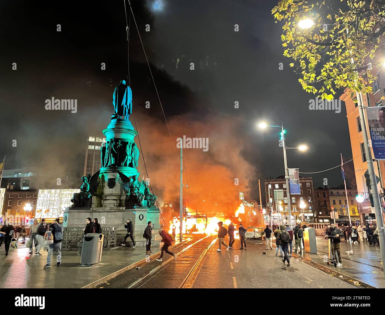 A bus and car on fire on O'Connell Street in Dublin city centre after ...