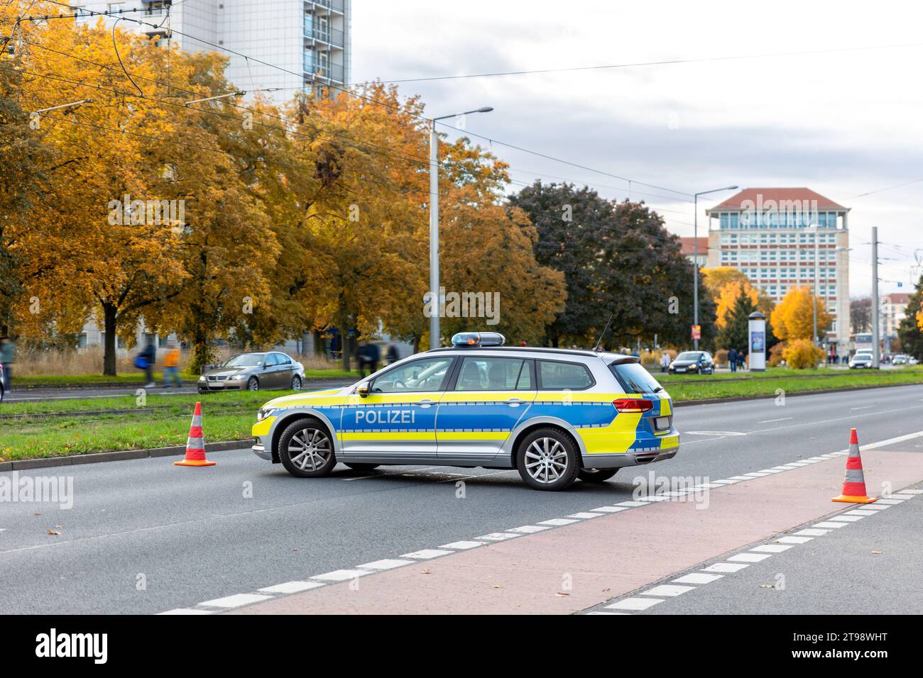 German Police car blocks road traffic at Dresden city street for safety ...