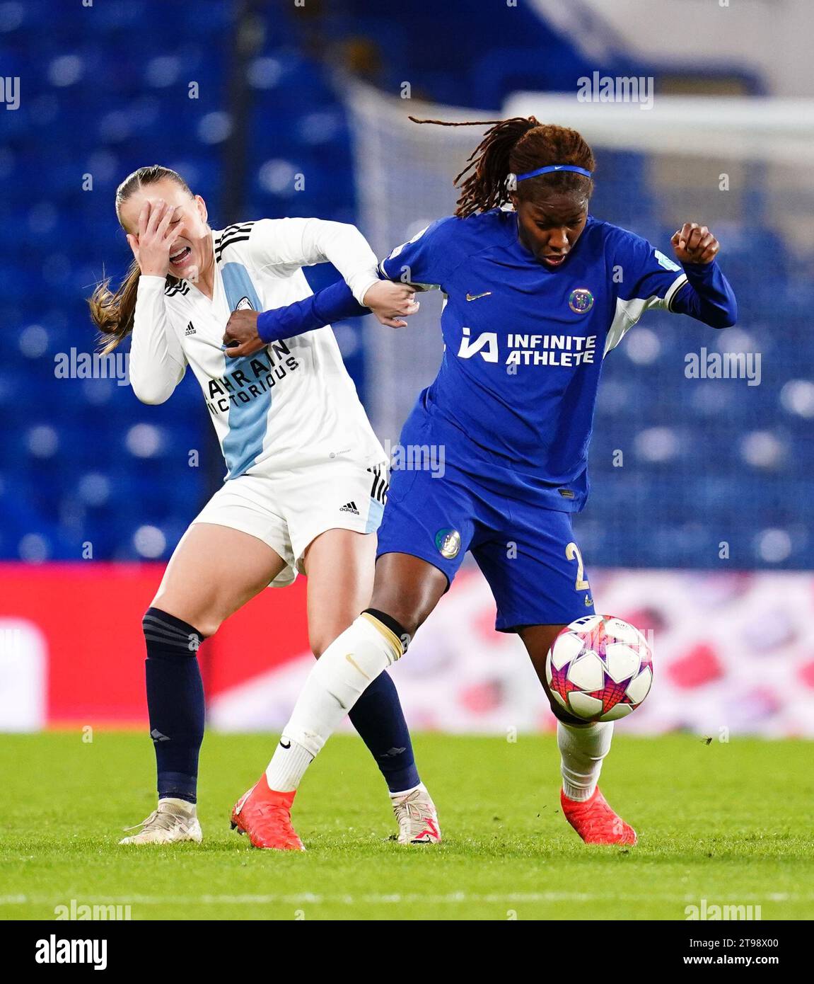 Paris FC's Julie Dufour (left) battles for the ball with Chelsea's ...