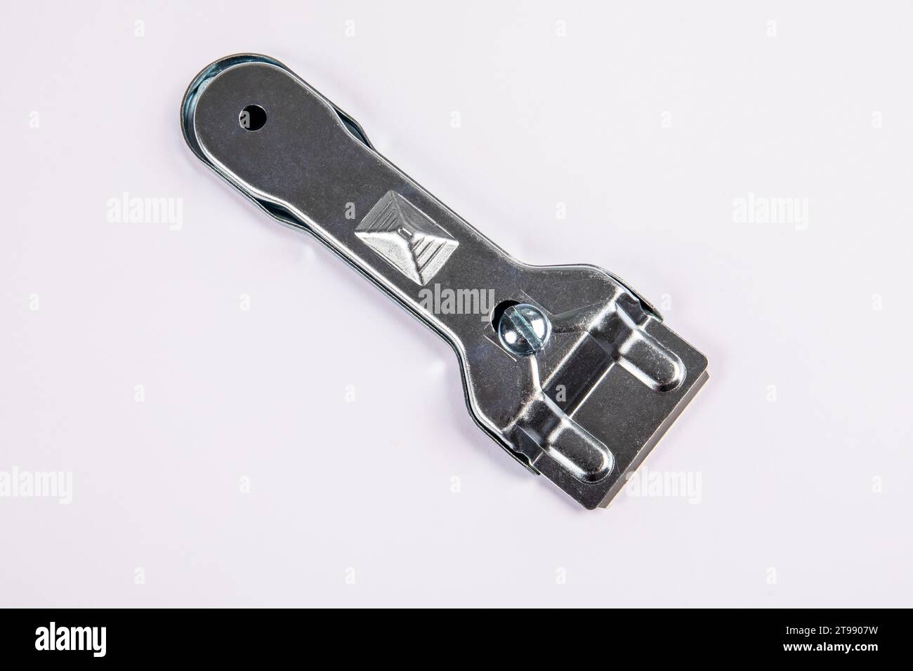 Glass ceramic scraper on a white background Stock Photo - Alamy