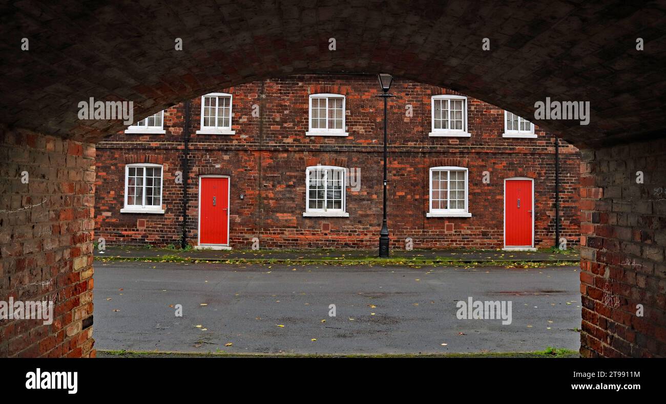 Looking through the arch from The Croft to the red doors of William ...