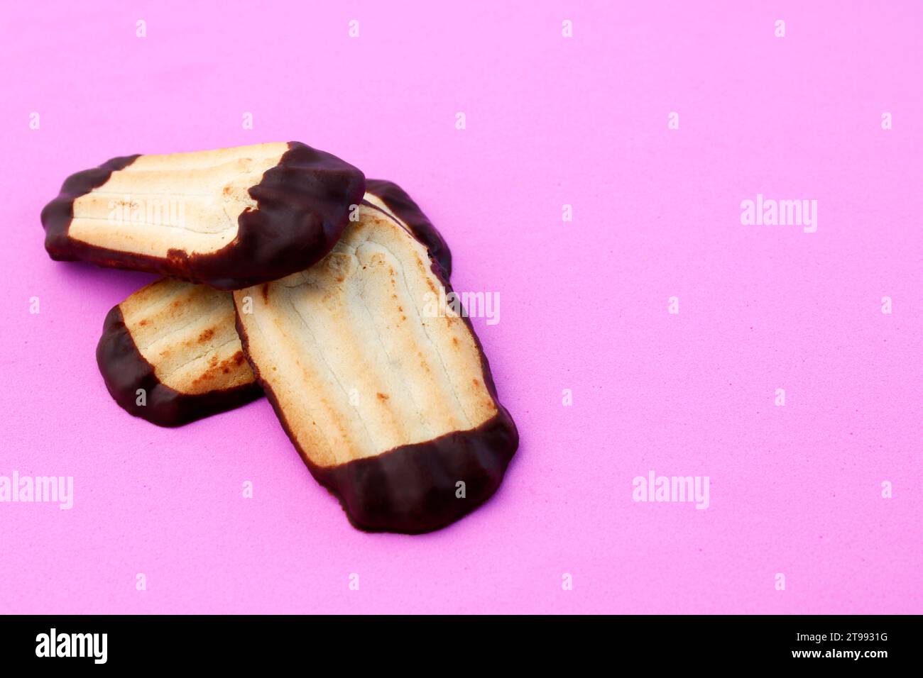Overlapping cookie with chocolate covered base Stock Photo - Alamy