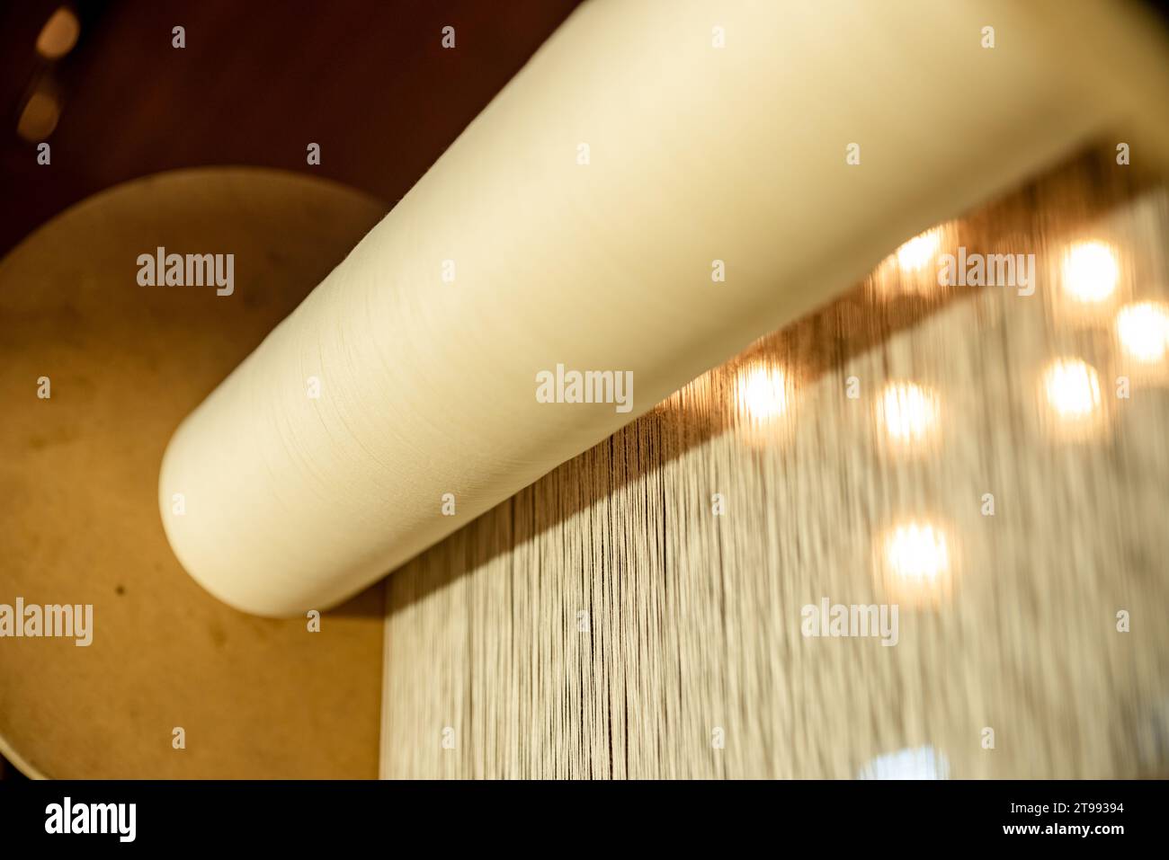 Traditional textile manufacture Weaving thread for the textile industry ...