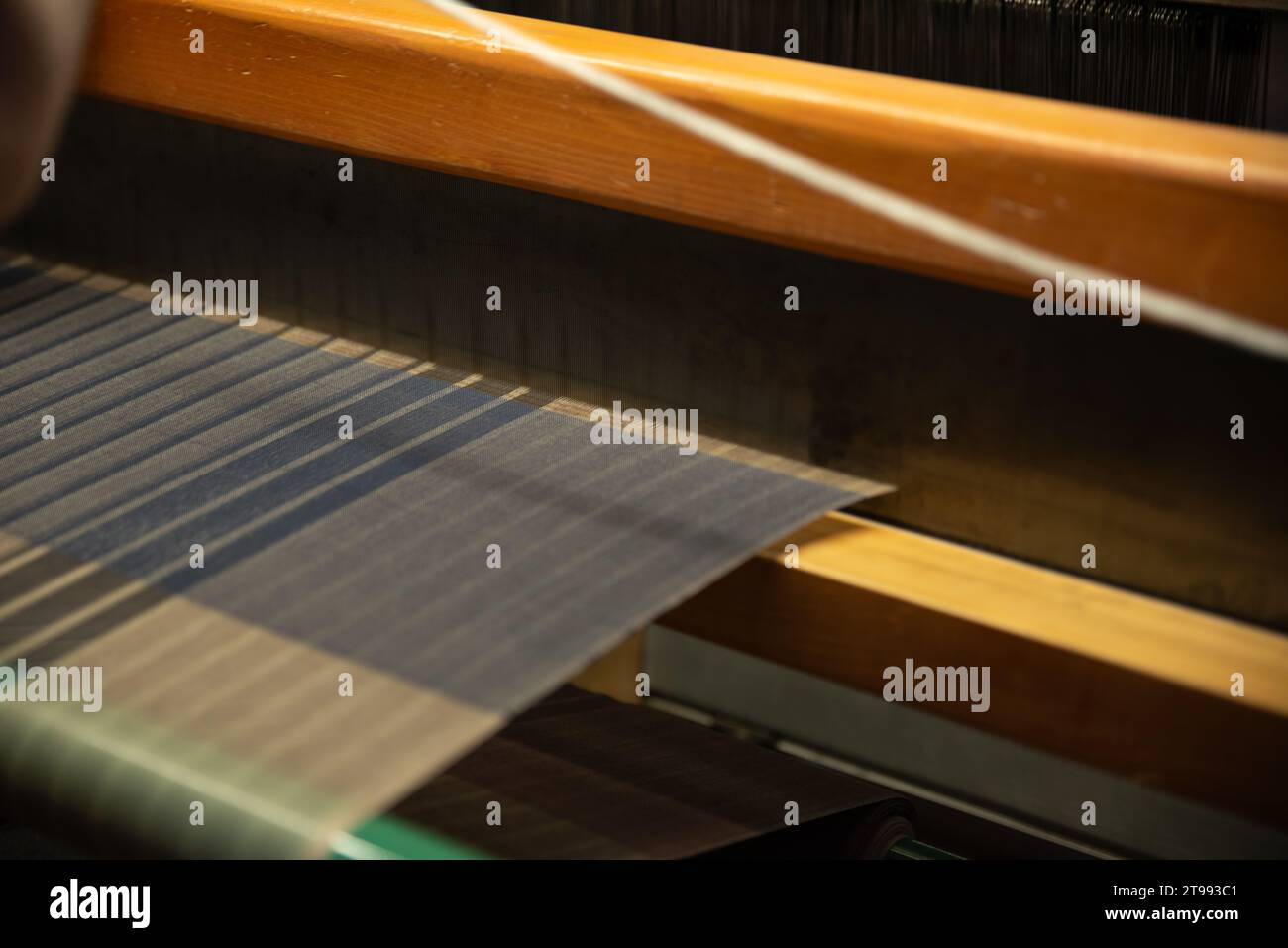 Traditional textile manufacture Weaving thread for the textile industry ...