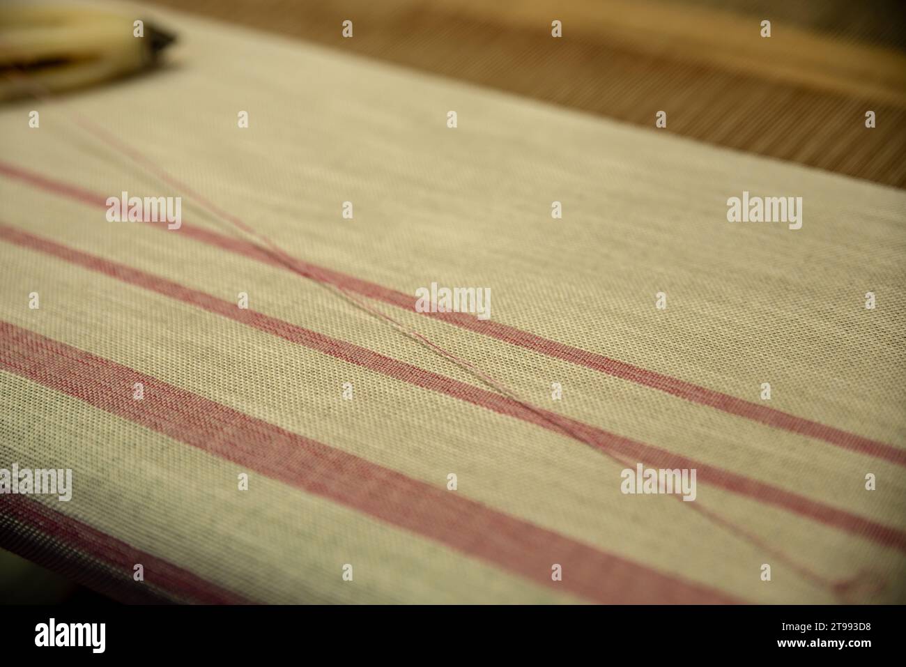 Traditional textile manufacture Weaving thread for the textile industry ...