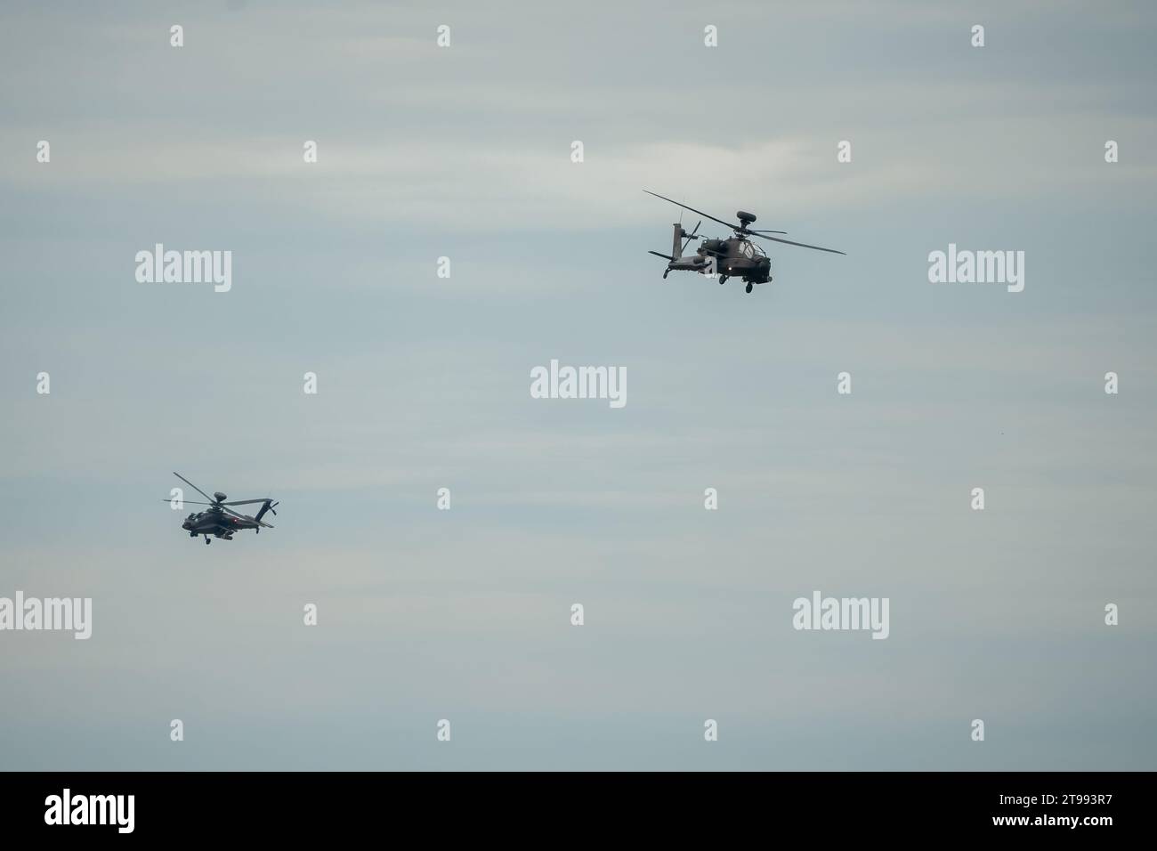 a pair of British army Boeing Apache Attack helicopters (AH-64E Army ...