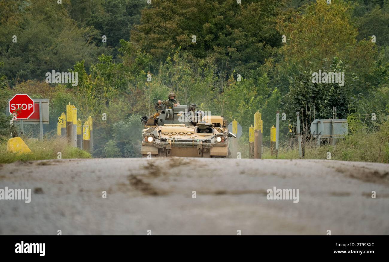 british army FV512 Warrior vehicle in action on manoeuvres Wiltshire UK ...