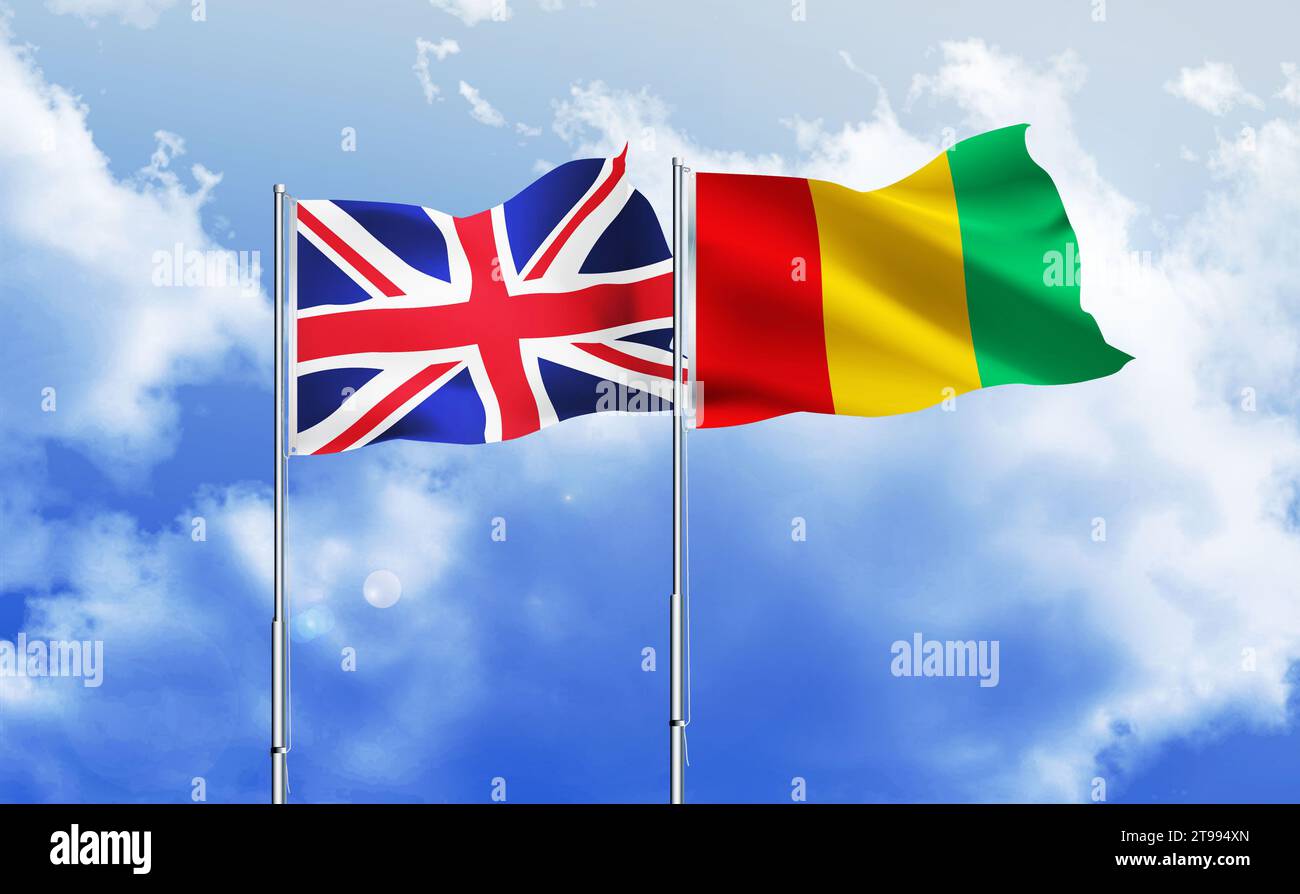 Guinea,UK flags together waving against blue sky Stock Photo - Alamy