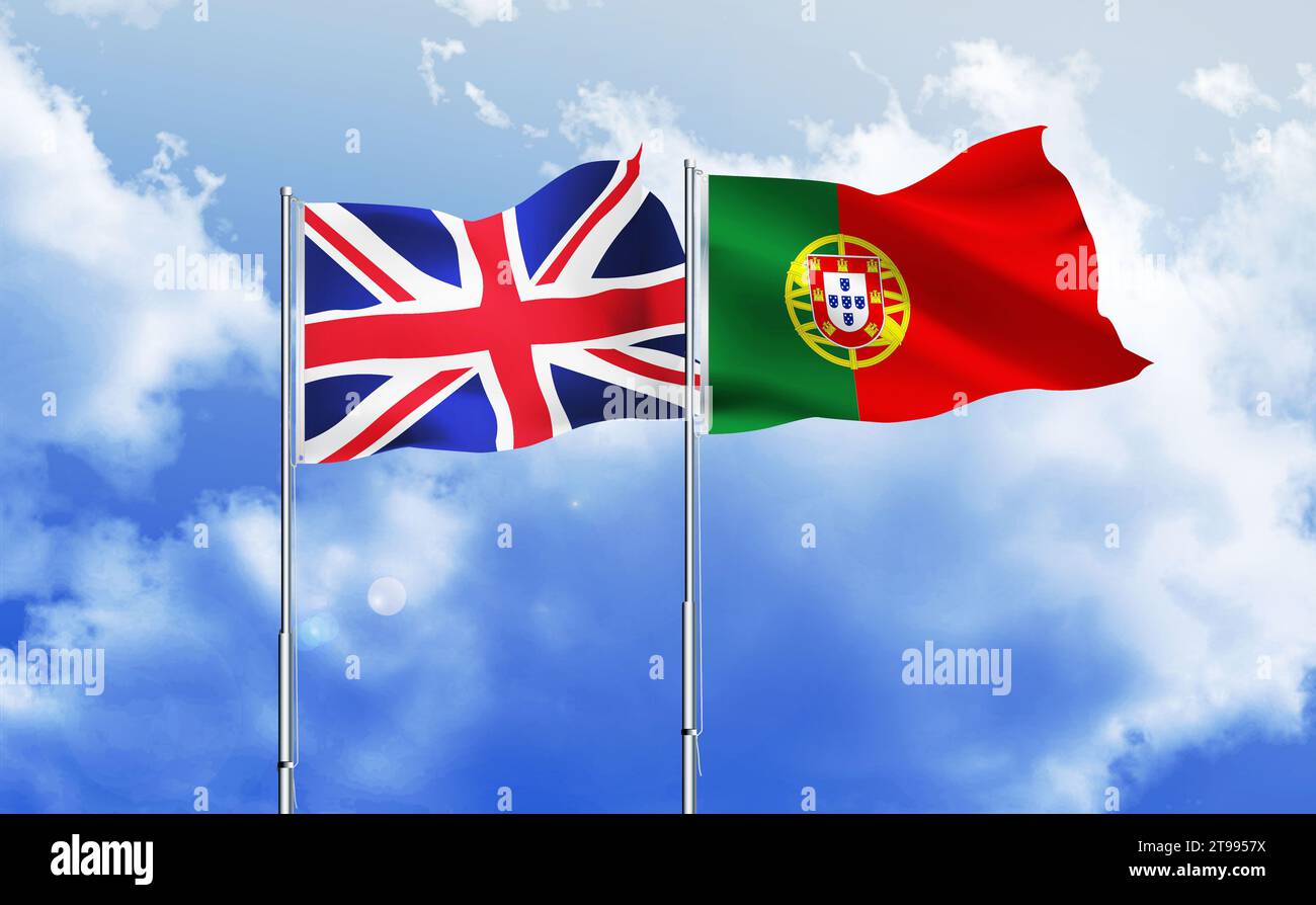 Portugal,UK flags together waving against blue sky Stock Photo - Alamy