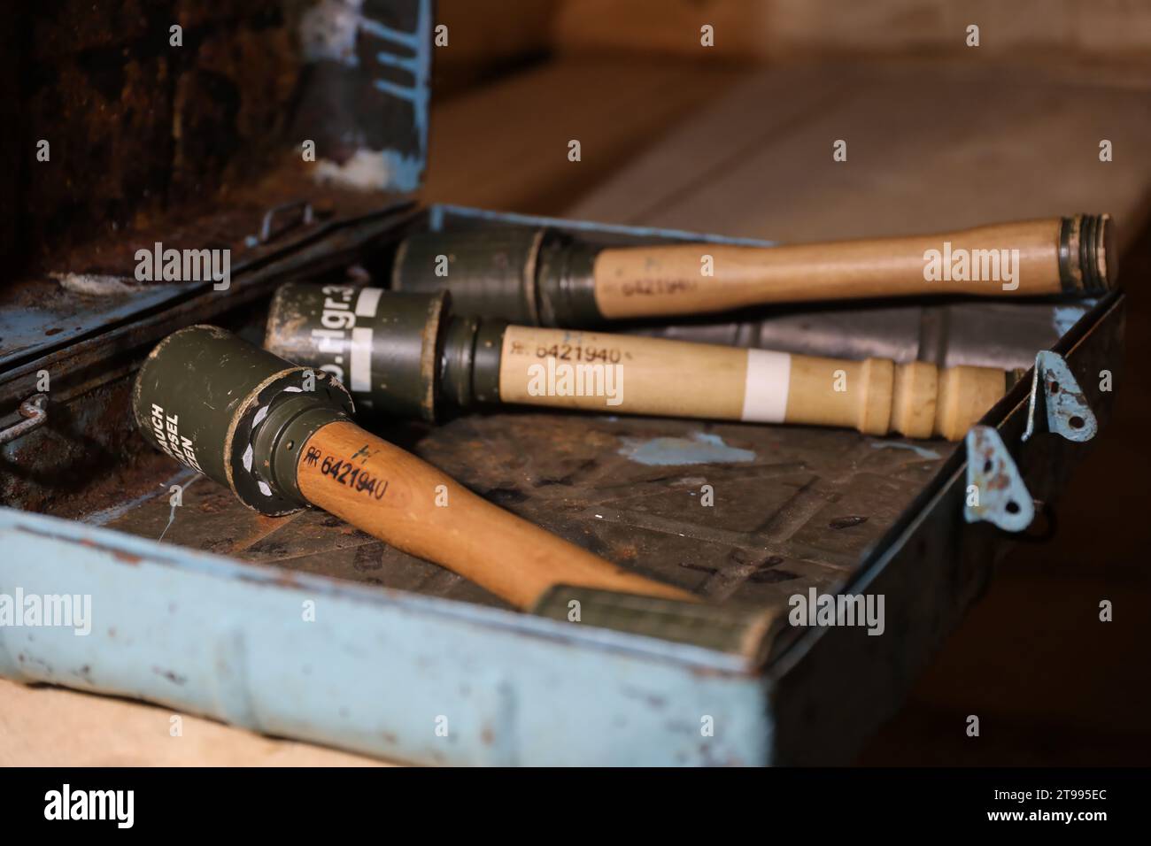 World War II german fragmentation grenades stacked in a military box on ...
