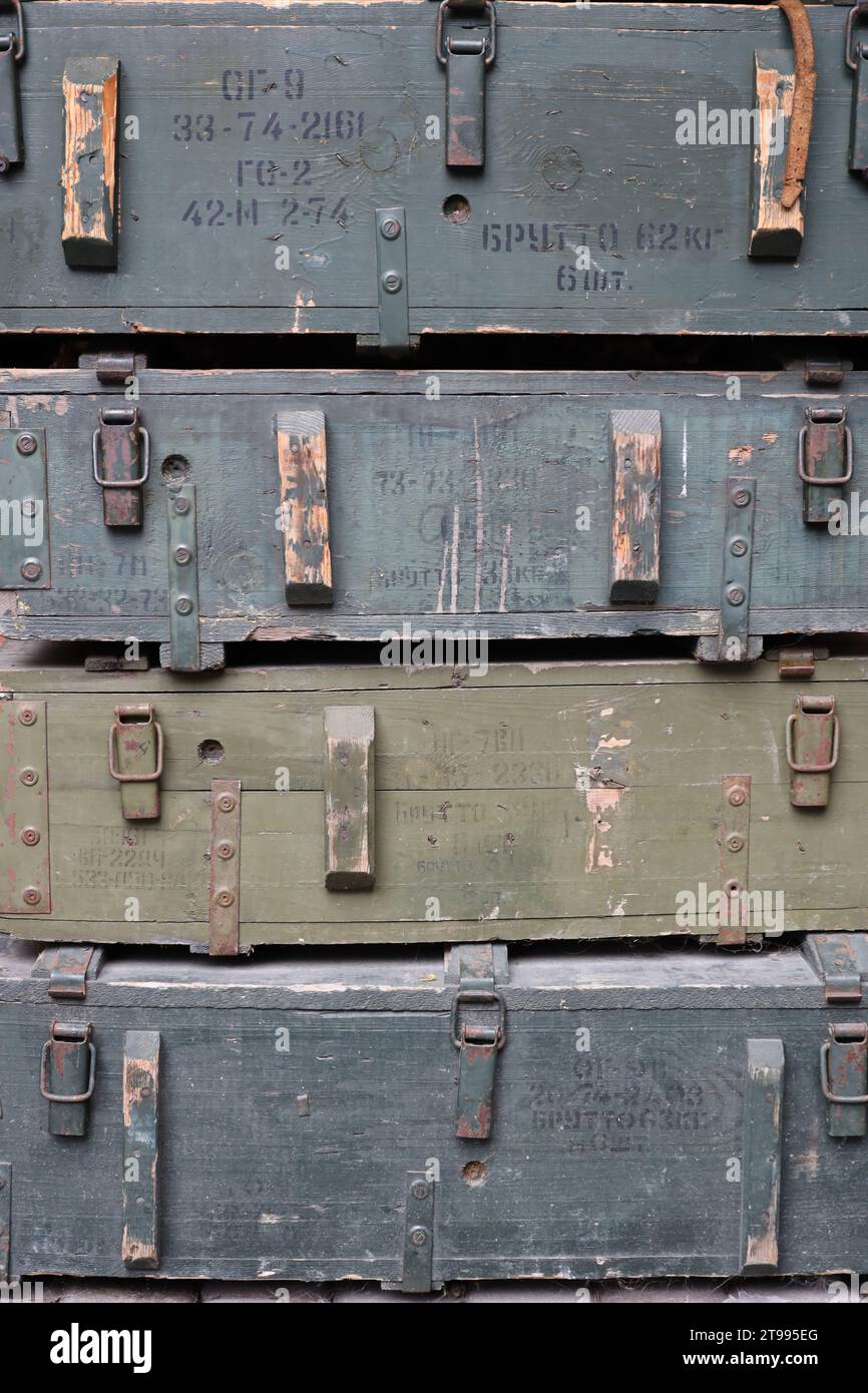 Soviet army ammunition stack of green crates with russian names of ammo ...