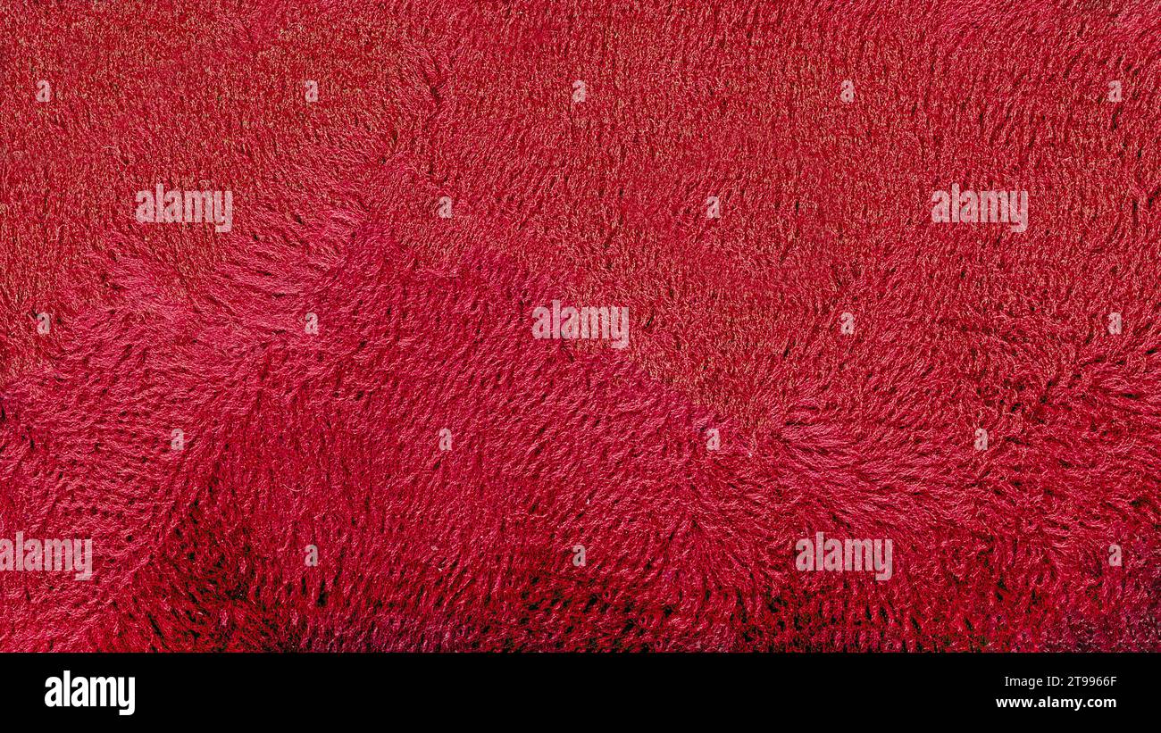 red plush fabric texture useful as a background Stock Photo - Alamy