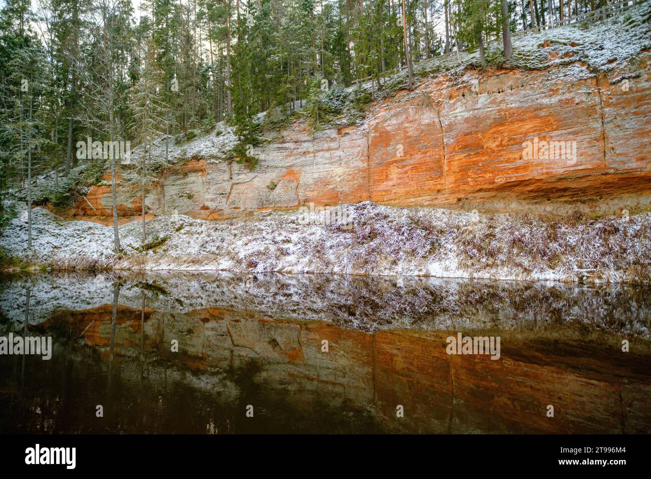 The river Salaca is meandered by high sandstone cliffs. Skanaiskalns ...