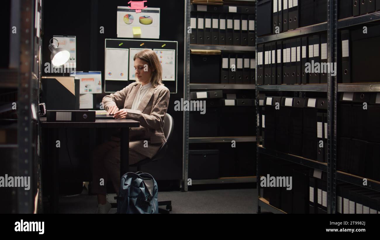 Solving the crime, private detective comes and examines evidence on ...