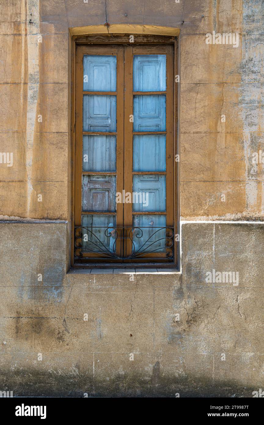 Architectural detail of a wall with closed window Stock Photo - Alamy