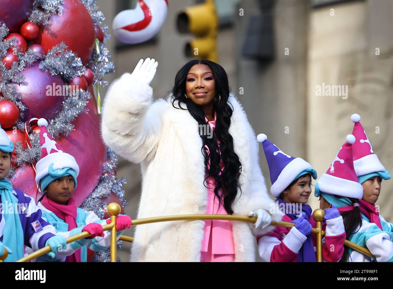 Global superstar Brandy rides the Palace of Sweets from Brach's float ...