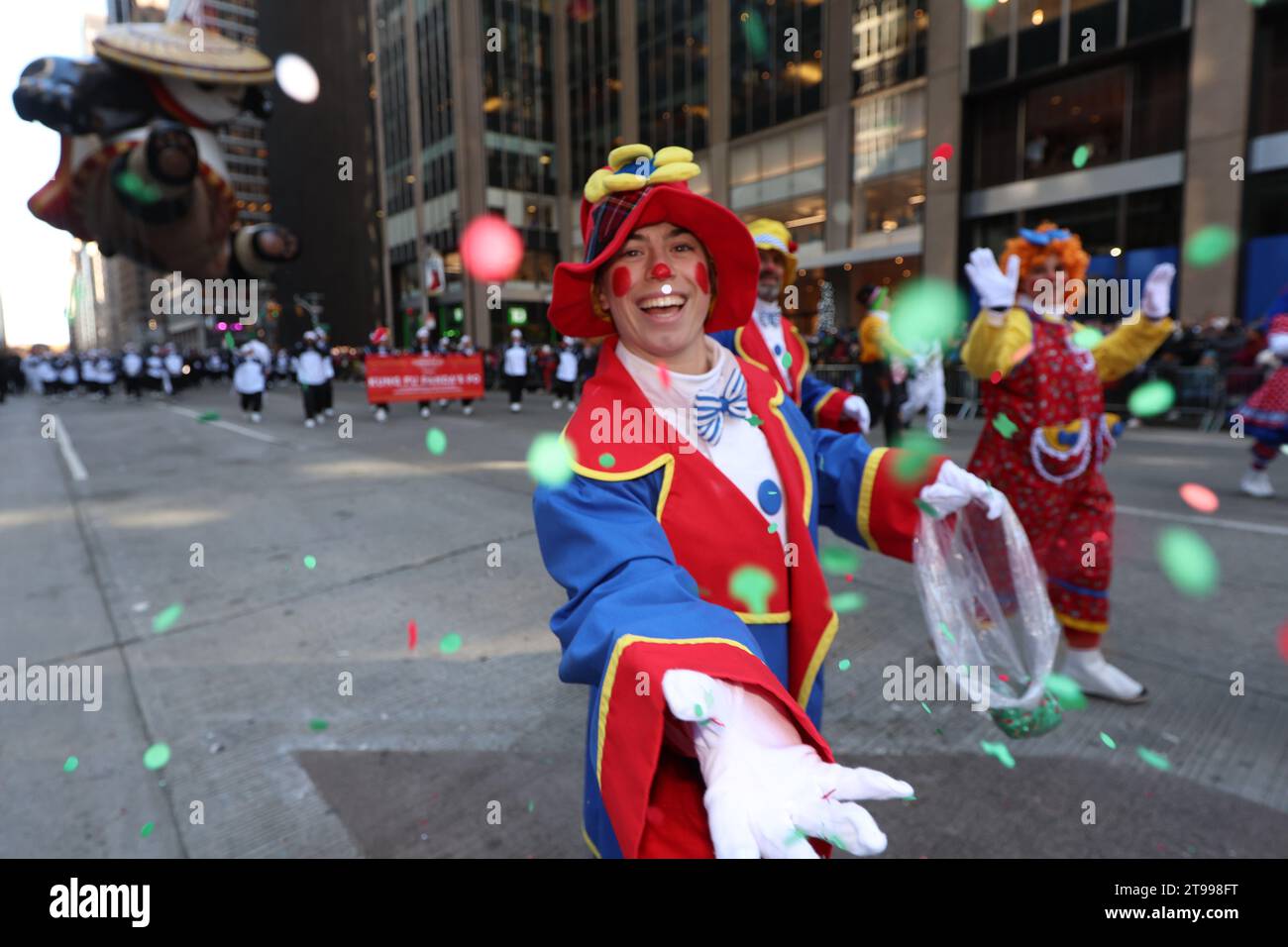 A member of the Circus Clowns hits the photographer with confetti ...