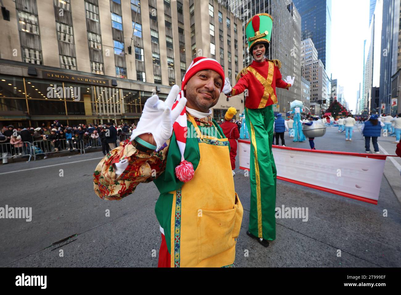 One of the helpers on board the Santa’s Sleigh float during The 97th ...