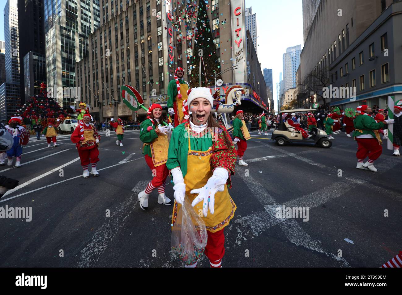 A member of the Santa's Toy Box Clowns hits the photographer with ...
