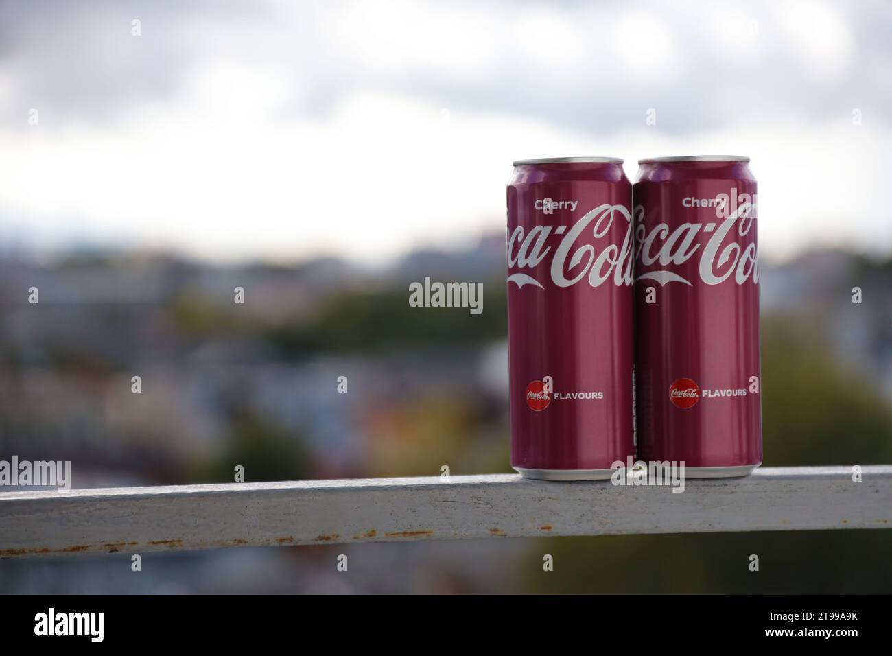 KYIV, UKRAINE - 4 MAY, 2023: Coca cola soft drinks brand tin cans with ...