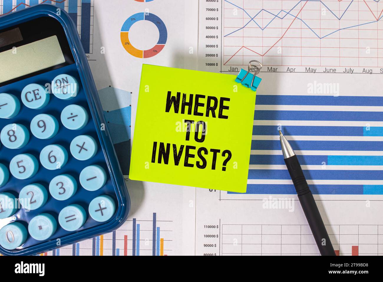 Hand writing the text: Where to Invest Stock Photo - Alamy