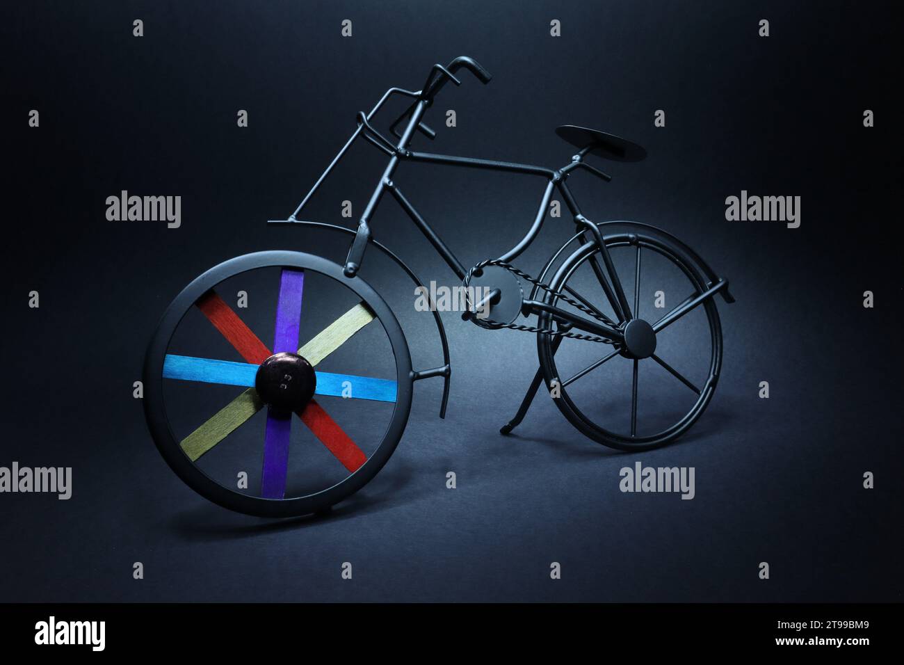 Black bike on a black background Stock Photo - Alamy