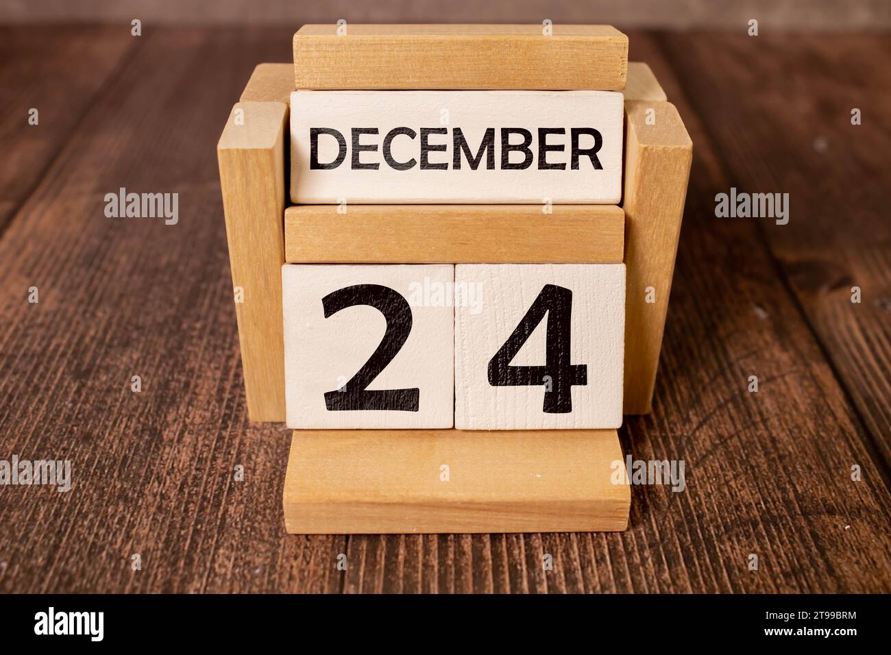 Christmas Wooden Calendar and Pine trees . 24 December Date Stock Photo ...