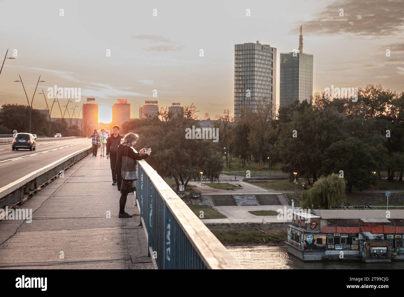 Picture of Branko's bridge during a sunny afternoon with an old woman ...