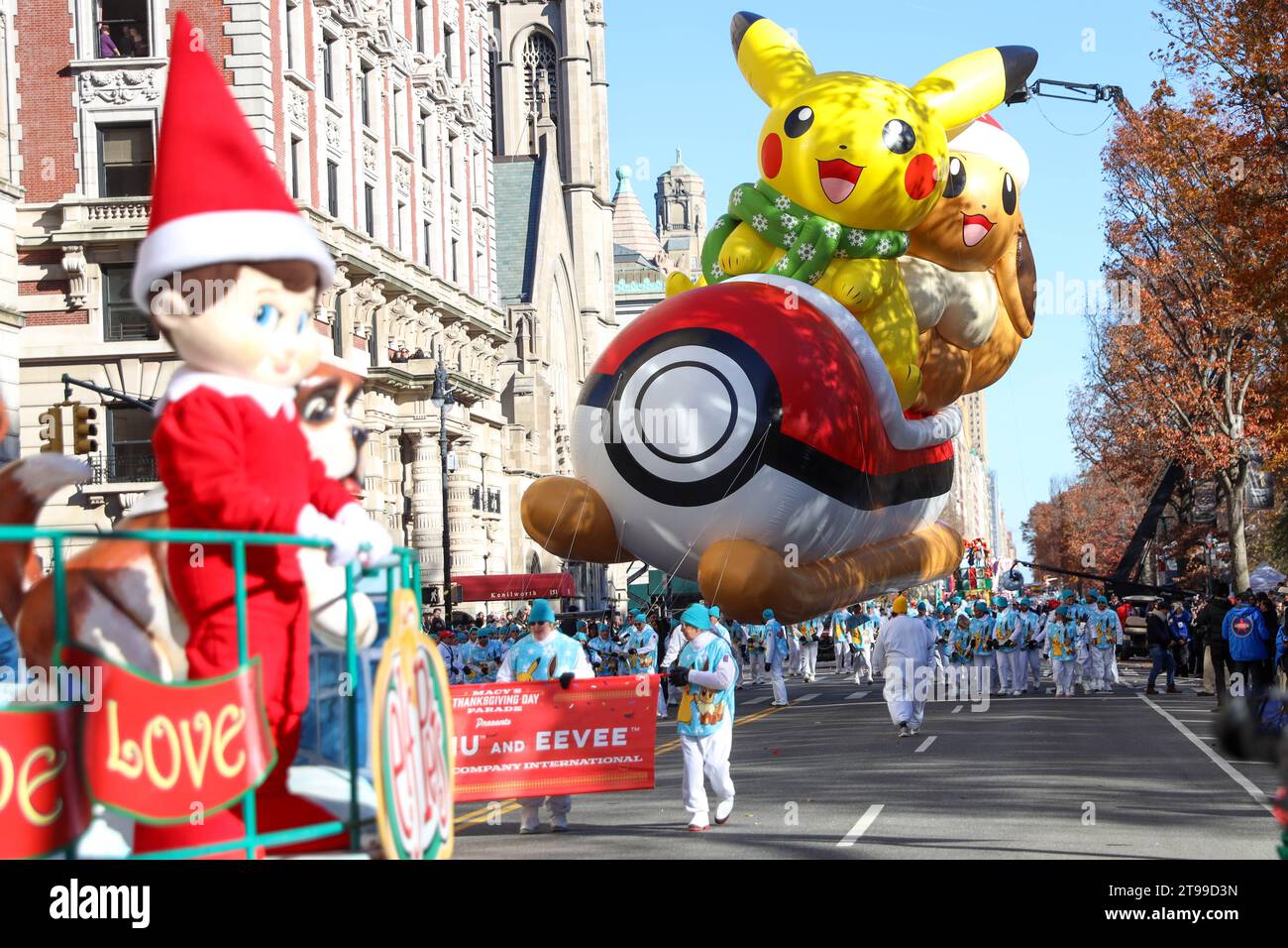 The Pikachu and Eevee balloon floats down Central Park West during the ...