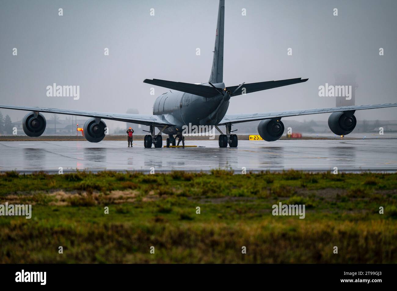 An Airman assigned to the 92nd Aircraft Maintenance Squadron marshals a ...